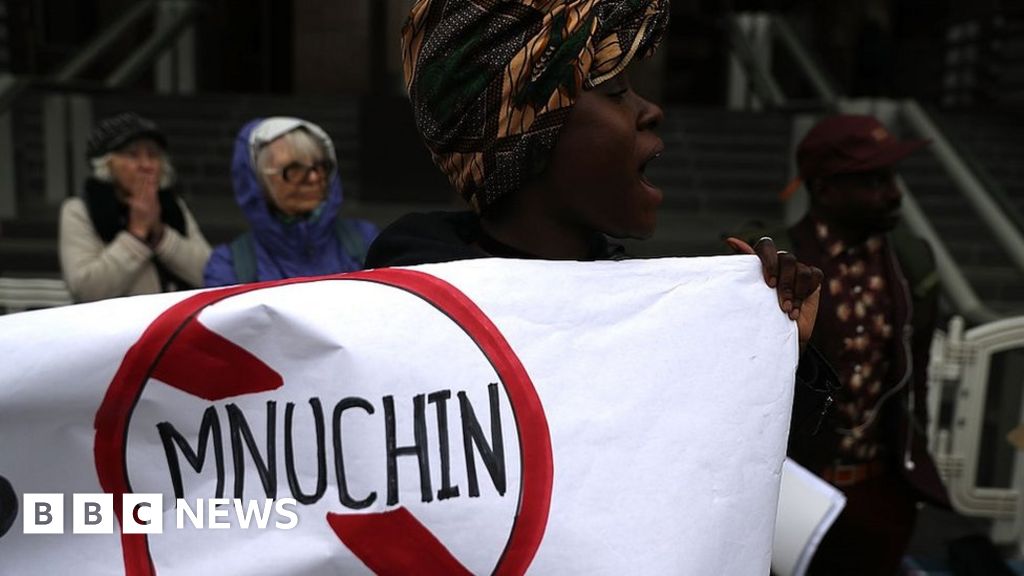 Mnuchin defends record during treasury secretary hearing - BBC News