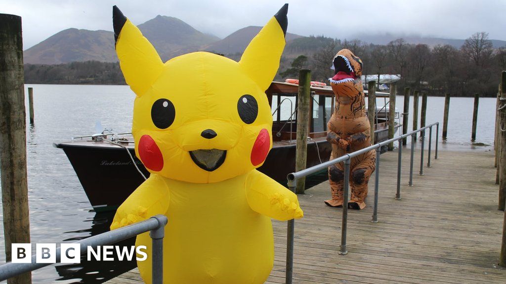 Covid-19: Keswick T-Rex and Pikachu spread lockdown happiness - BBC News