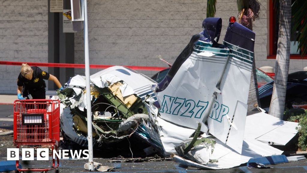 Santa Ana plane crash: Five dead as plane hits car park