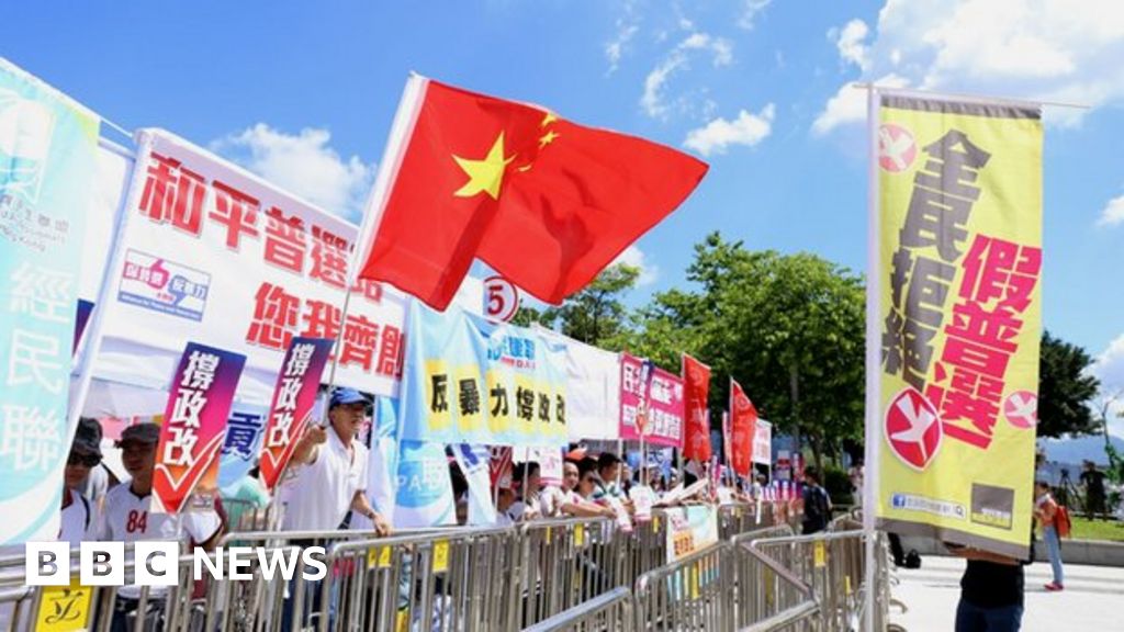 Hong Kong government debates divisive political reforms - BBC News