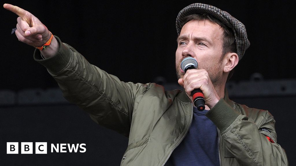 Glastonbury Festival has sombre opening - BBC News