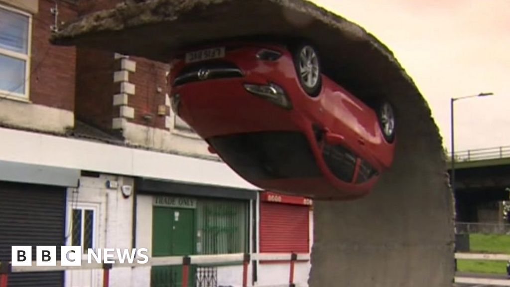 Upside-down car parked in Sheffield road goes on show - BBC News