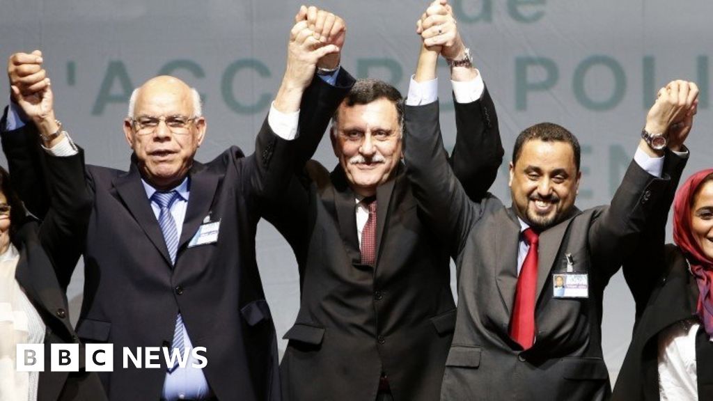 Libya conflict: Rival lawmakers sign deal in Morocco - BBC News