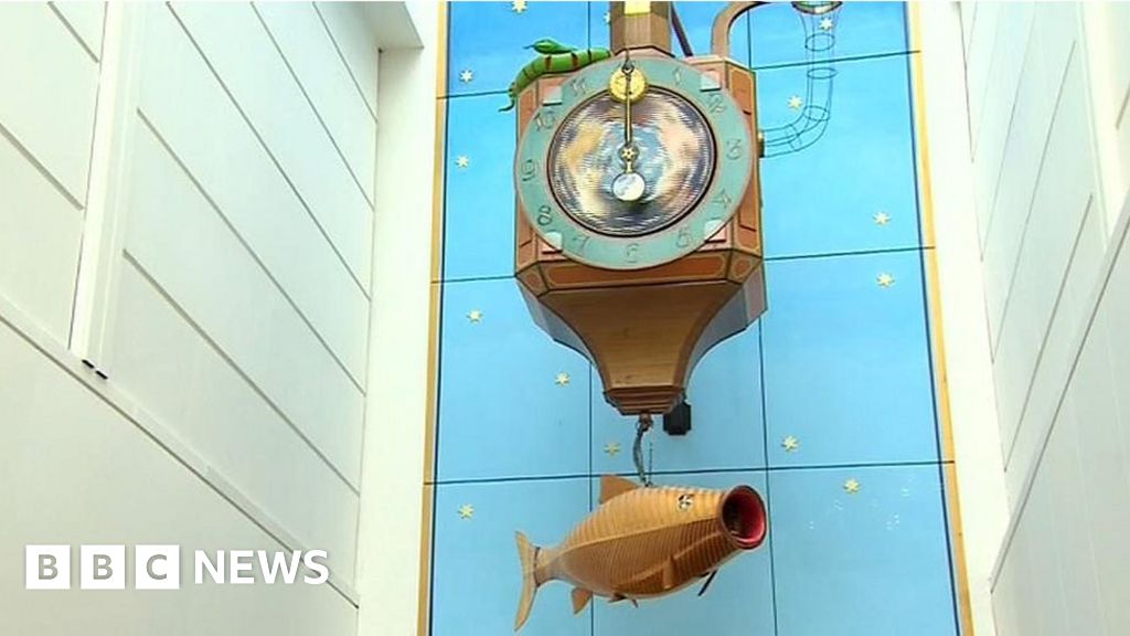 Cheltenham's wishing fish clock back in action - BBC News
