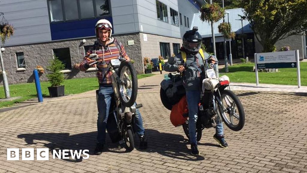 French students complete moped ride to university