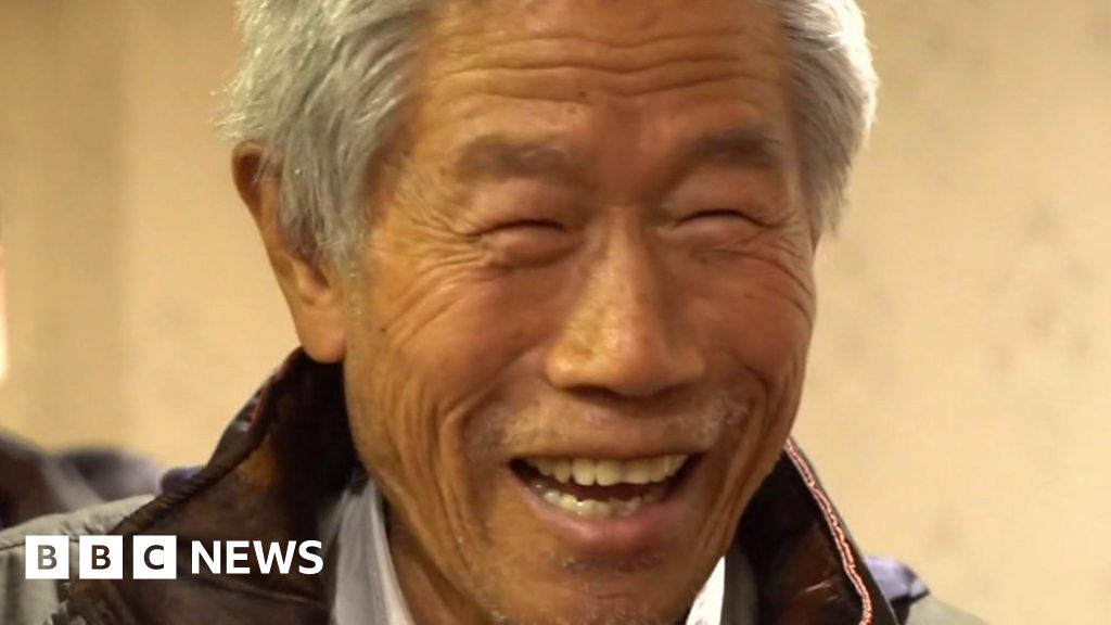 Joy as Chinese man reunited with family after 50 years - BBC News