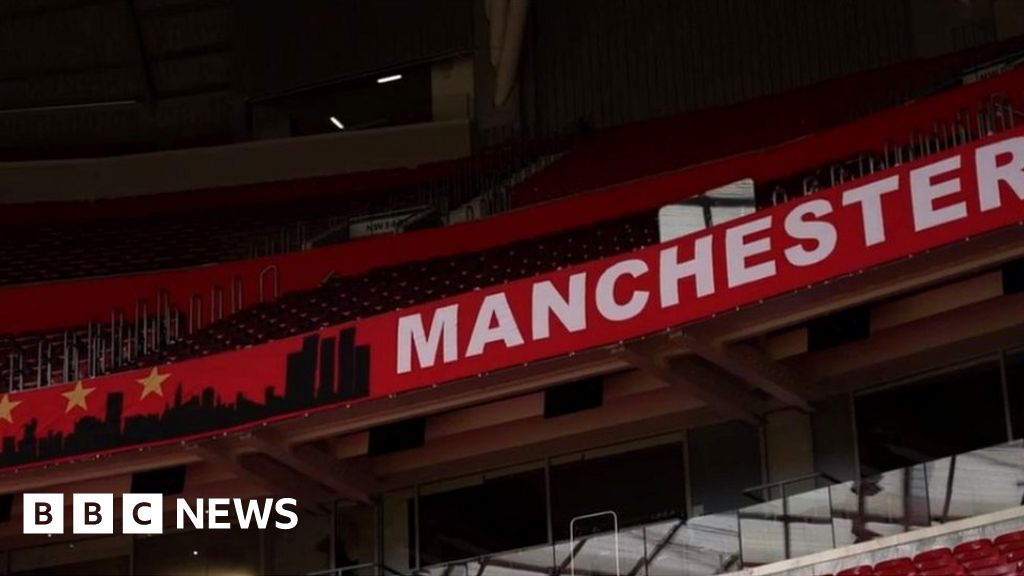 Manchester United banner updated to reflect changing city - BBC News