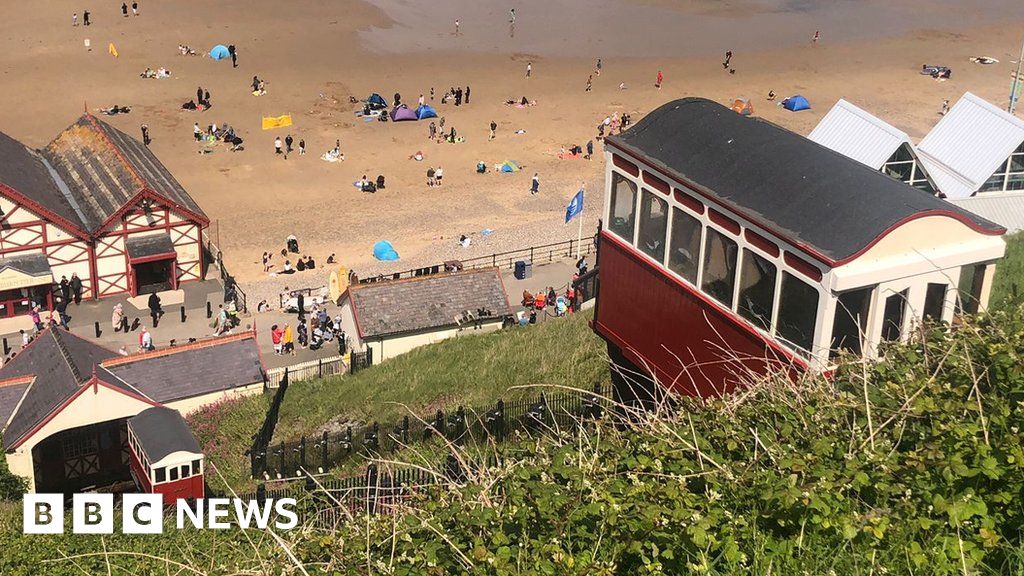 Saltburn's funicular tramway reopens after two years - BBC News