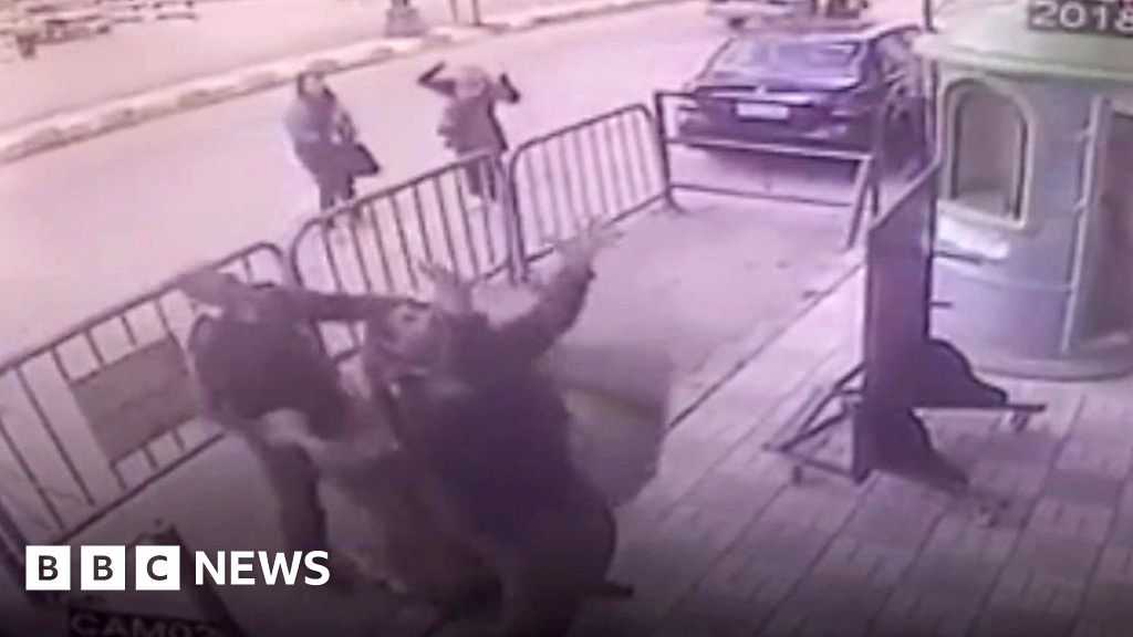 Moment policeman catches falling child - BBC News