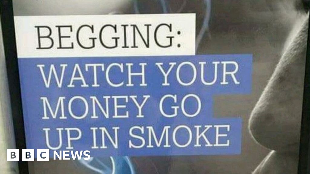 Protesters claim anti-begging posters 'demonise' homeless - BBC News