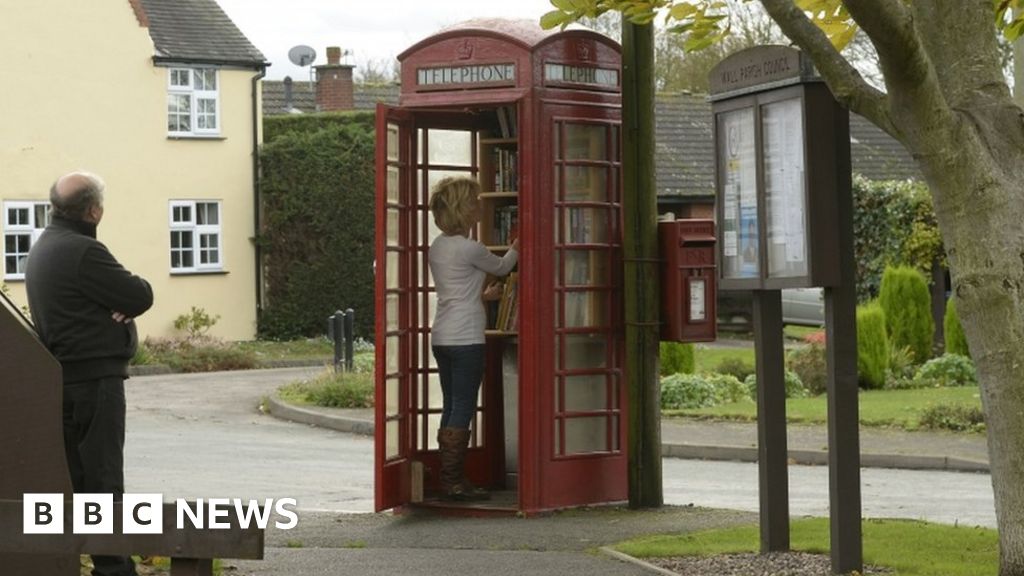 Red phone box in Wall becomes novel mini-library - BBC News