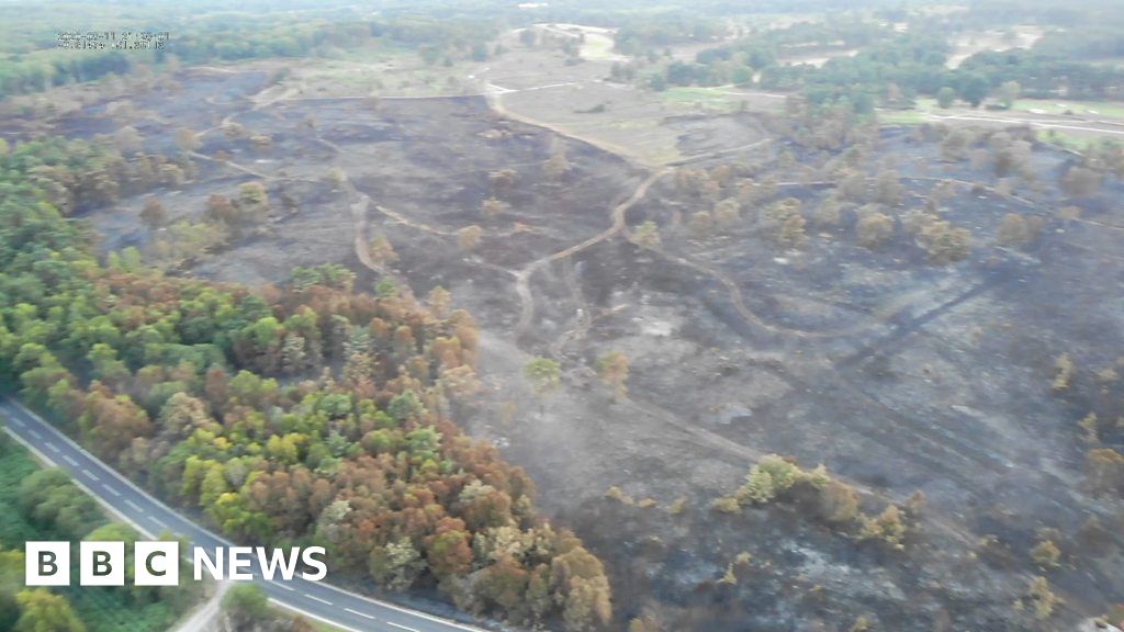 Chobham Common fire: Drone footage shows extent of damage - BBC News