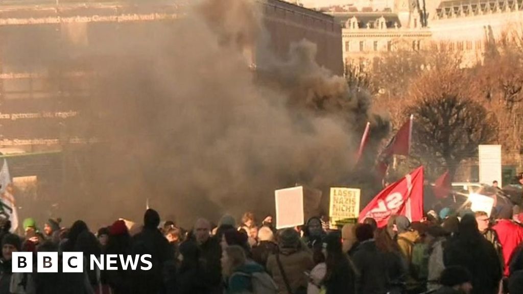 Austrians protest as far-right joins coalition - BBC News