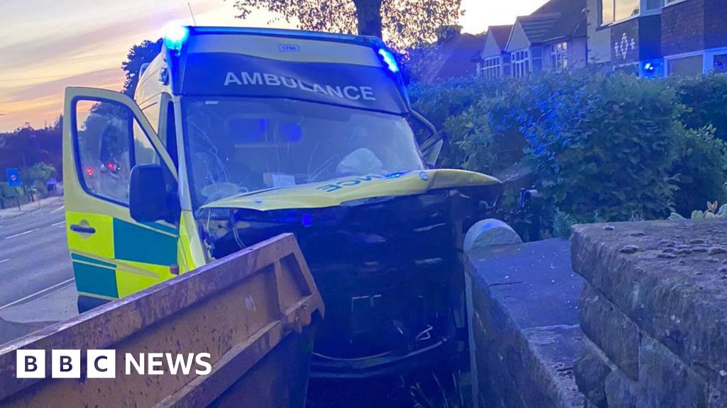 Sheffield ambulance crash: Crew member injured in skip collision - BBC News