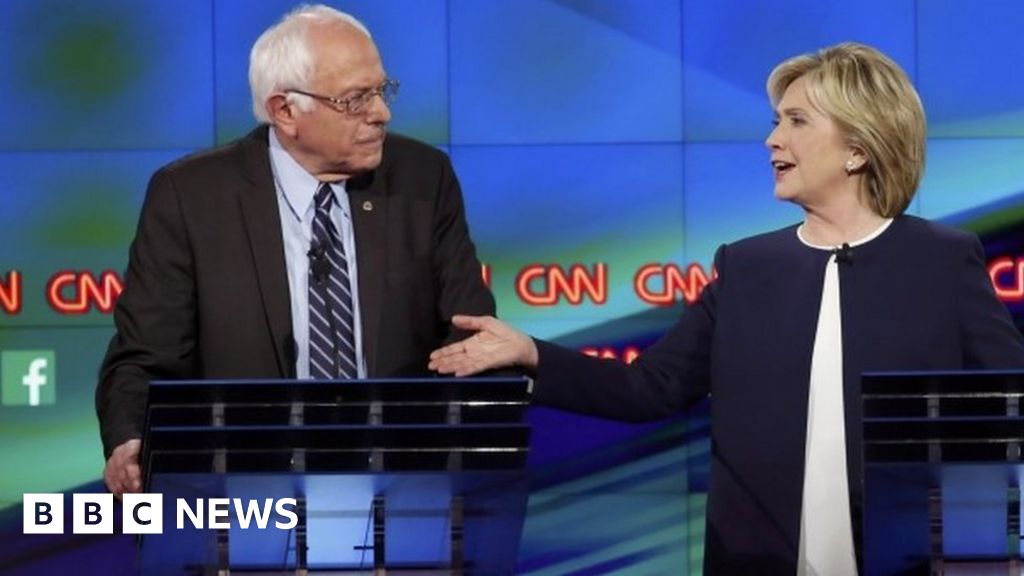 Clinton and Sanders clash in Democratic TV debate - BBC News