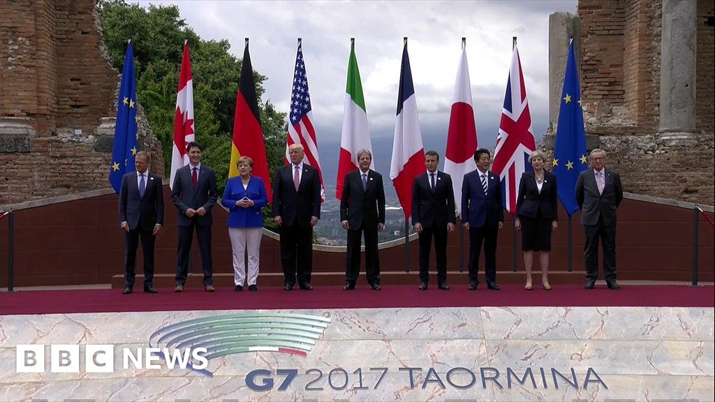 G7 leaders pose for 'family photo' at Sicily summit - BBC News