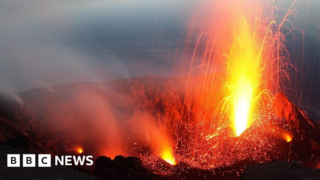 The volcanologist who climbs active volcanoes - BBC News