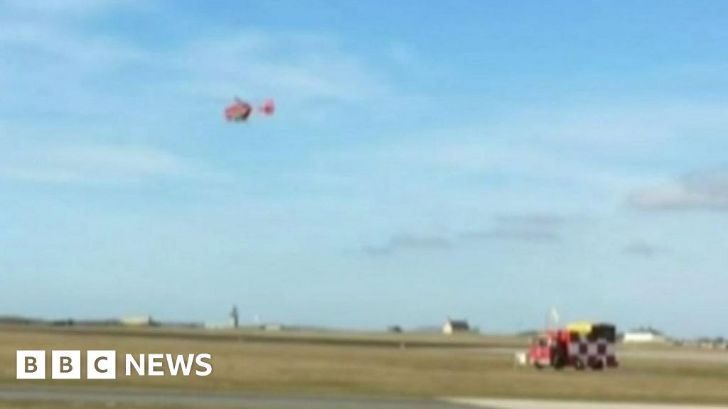 Air ambulance at RAF Valley Red Arrows jet crash site - BBC News