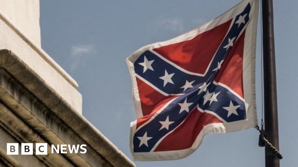 Confederate flag lowered in South Carolina - BBC News