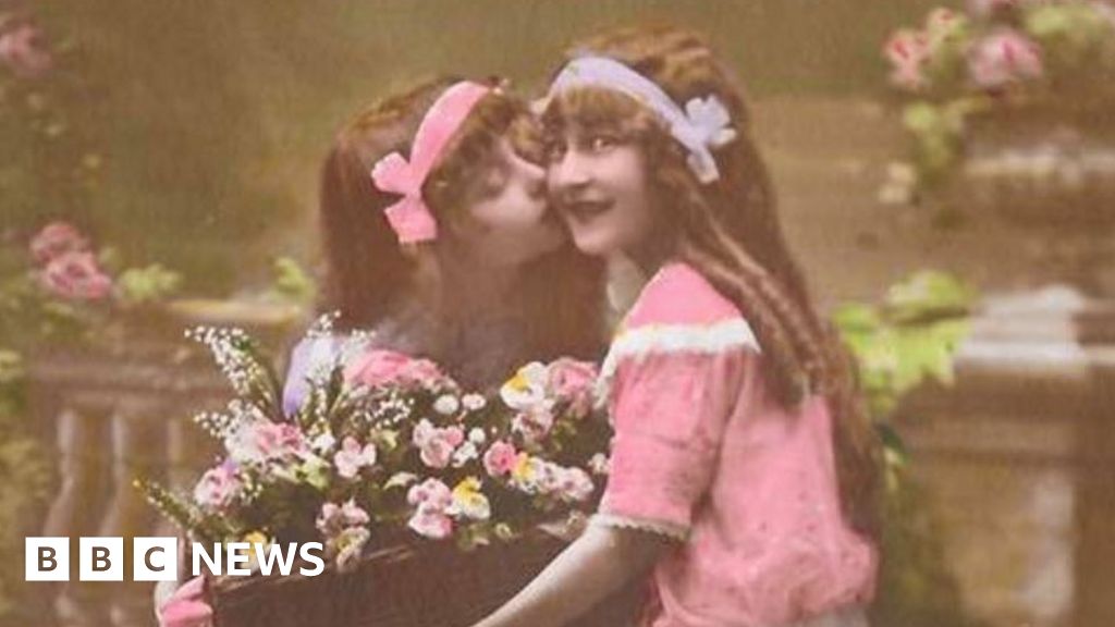 Postcards sent back to original address to 'bring joy' - BBC News