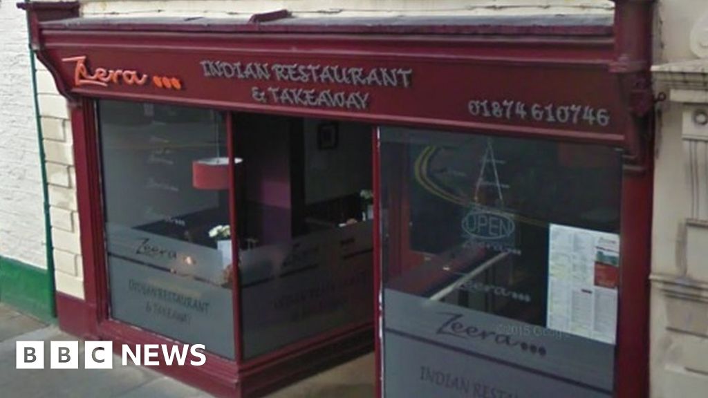 Illegal immigrants arrested at Brecon Indian restaurant - BBC News