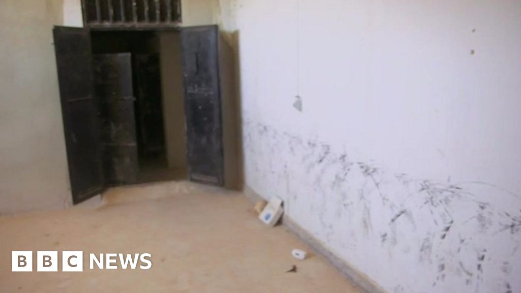 Guided tour around an abandoned IS prison - BBC News
