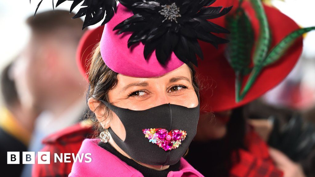 Ladies Day at Cheltenham Festival: Masks and fascinators - BBC News