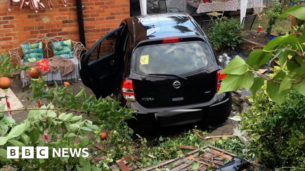 Lucky escape as car crashes into children's party - BBC News
