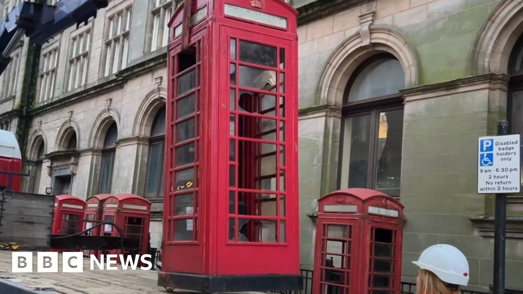 Restoration of Preston's red phone boxes gets under way - BBC News