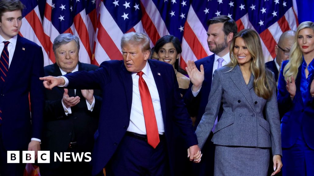 Surrounded by family, Trump says he will 'heal the country'