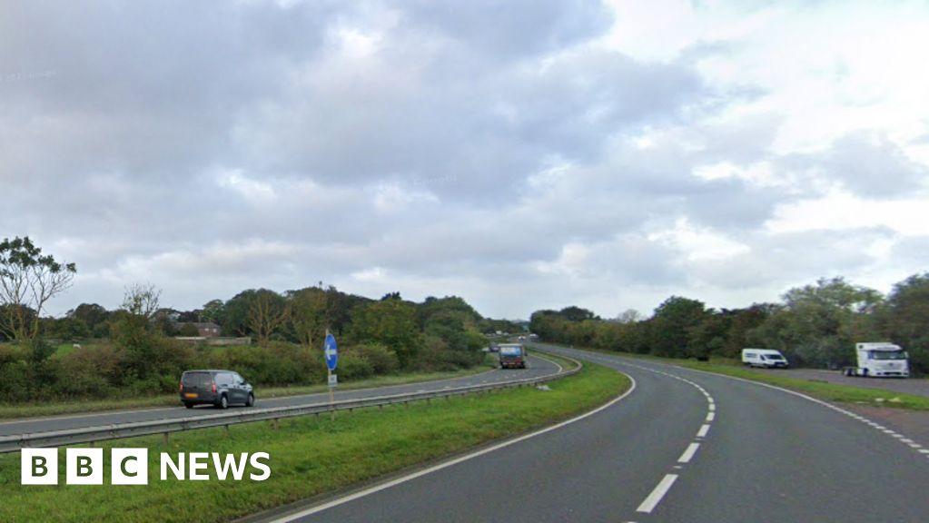Woman leaving vehicle on A184 dies after being hit by car - BBC News