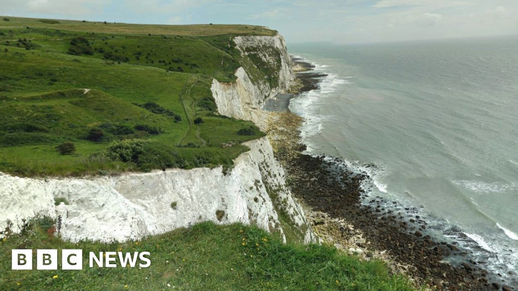 Dover cliff death twins identified by police - BBC News