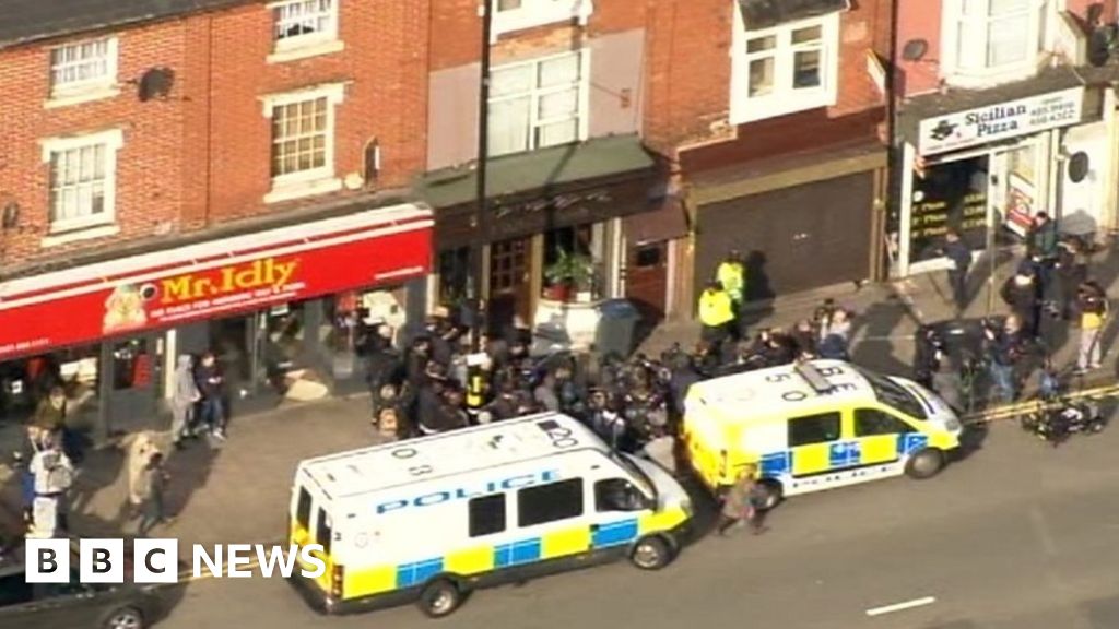 London attack: Police raids in Birmingham as killer named - BBC News