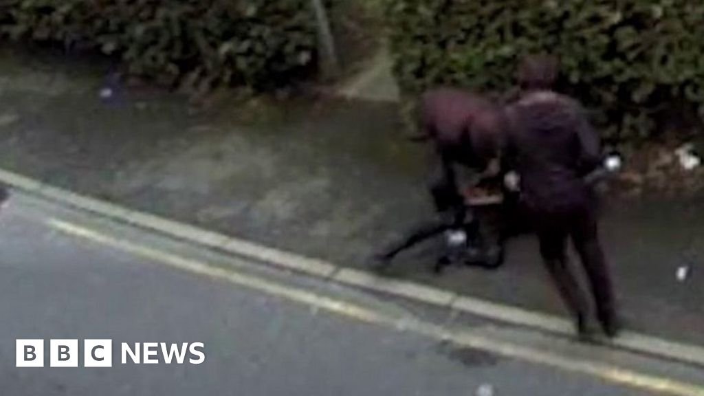 CCTV shows 'vile' robbery of woman in Birmingham - BBC News