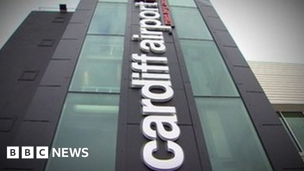 Cardiff Airport security staff to get 'real living wage' - BBC News