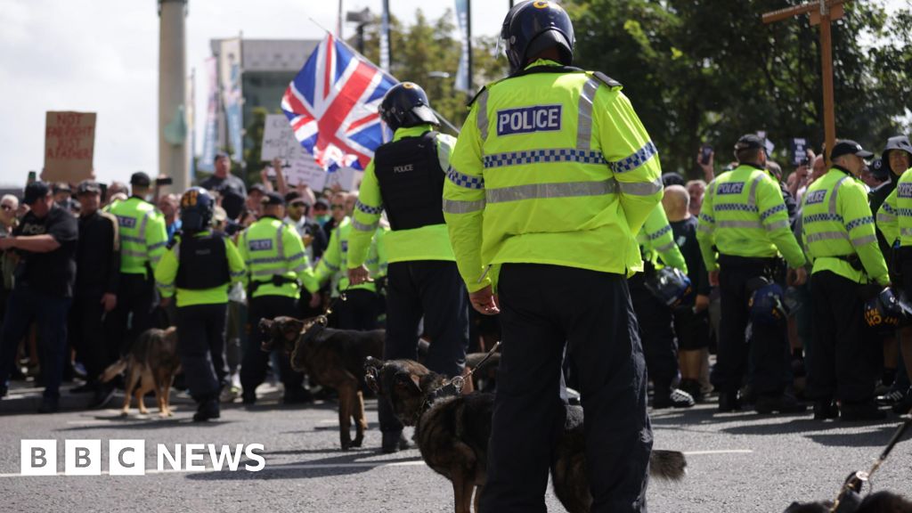 Three charged with violent disorder over Liverpool unrest - BBC News