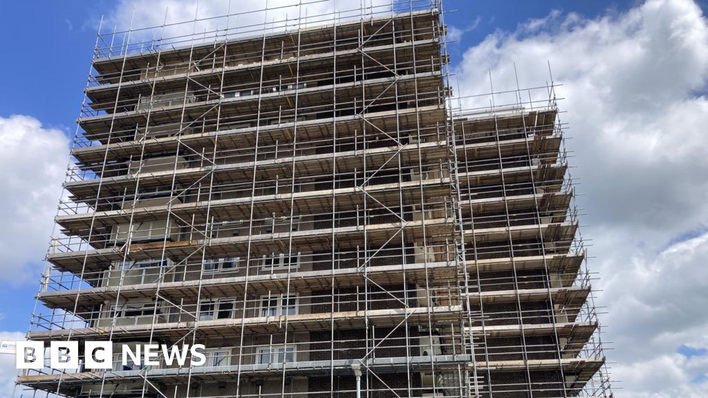 Halifax tower block residents 'really sad' about eviction - BBC News