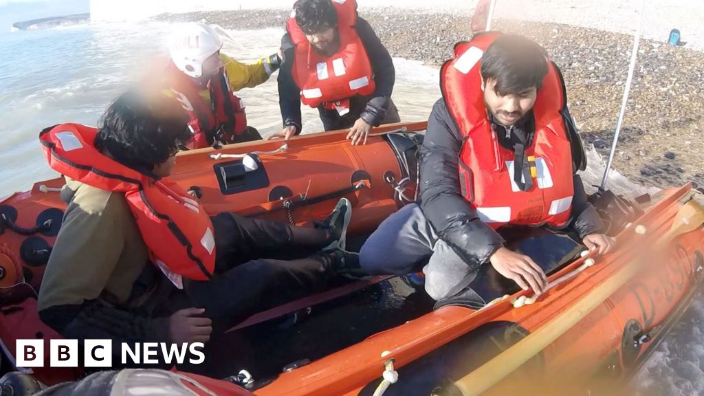 Watch: Students cut off by tide rescued by RNLI