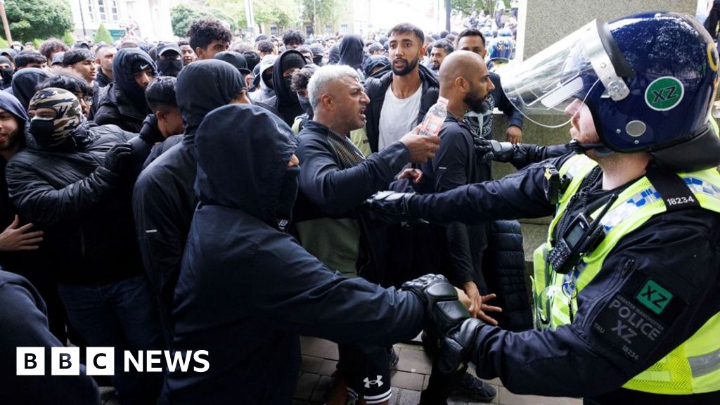 Clashes in Bolton between rival groups after protest