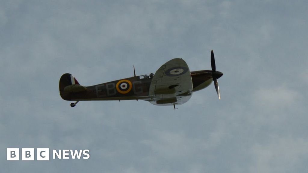 Battle of Britain Spitfire flypast at RAF Cosford - BBC News
