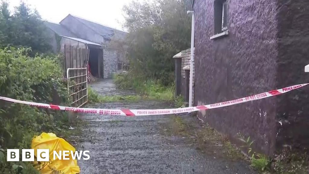 Newry: Police investigation after man and woman found dead - BBC News