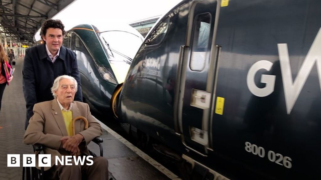Ex-railwayman marks 100th birthday on new train - BBC News