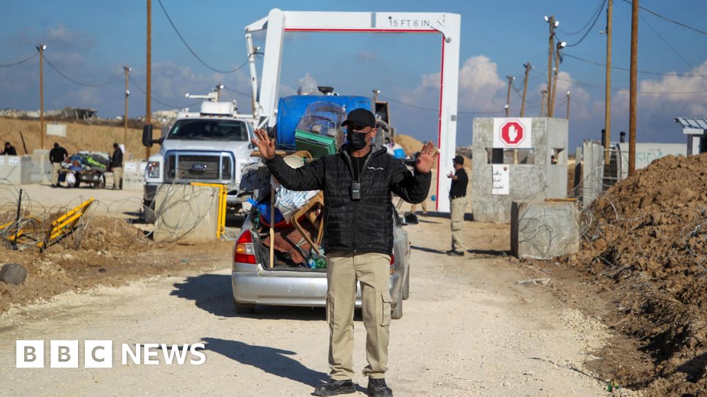 US and Egyptian contractors screening vehicles at Gaza checkpoint