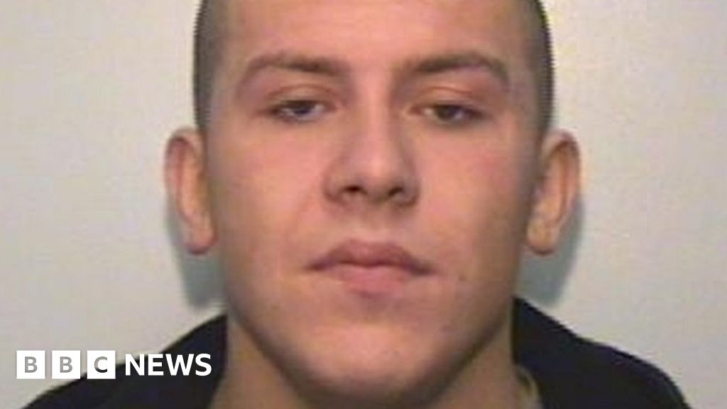 Manhunt for Wigan robber who drove couple at gunpoint to cash machine ...