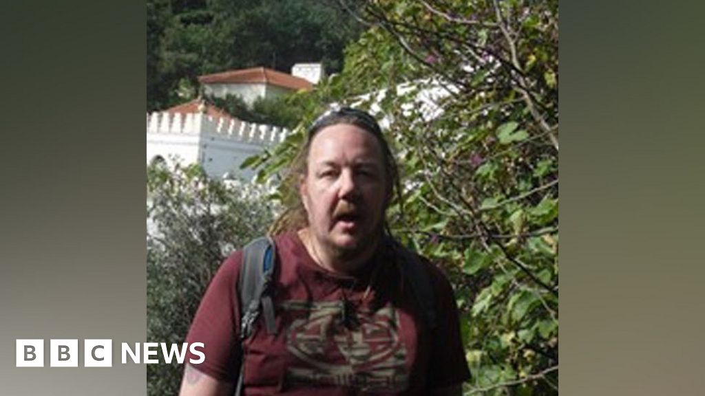 Murder charge after man found dead in Blackburn flat, police say