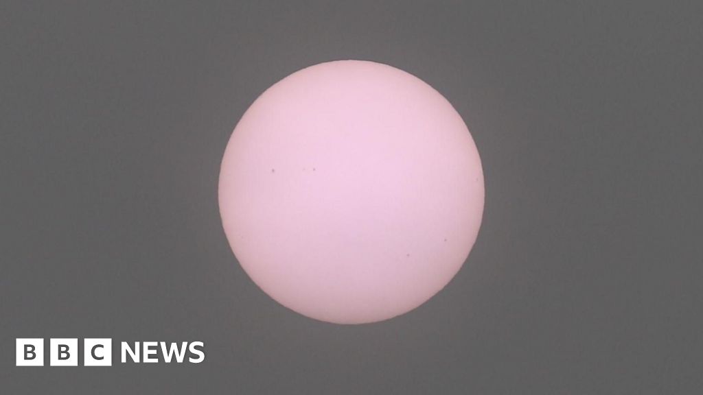 Wildfire smoke caught up in Storm Agnes causes unusual sky - BBC News