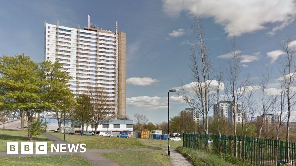 Woman arrested over 23 fires at Newcastle tower block - BBC News