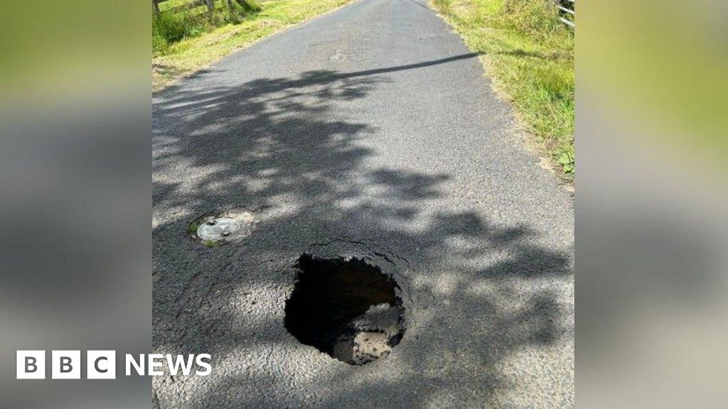 Repairs under way after sinkhole appears on Northumberland road - BBC News