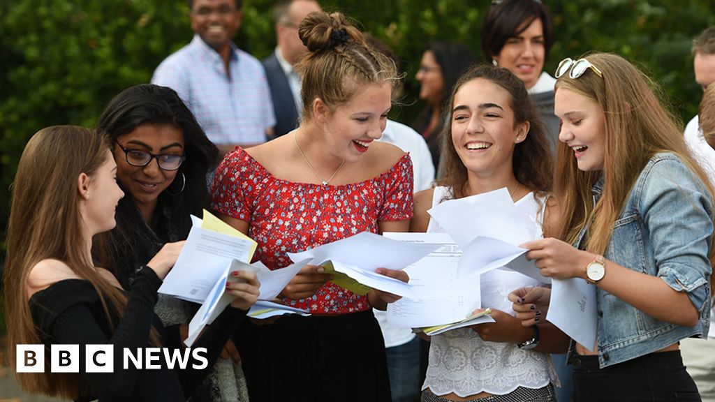 GCSE: Pass rate dips as students face tougher exams - BBC News