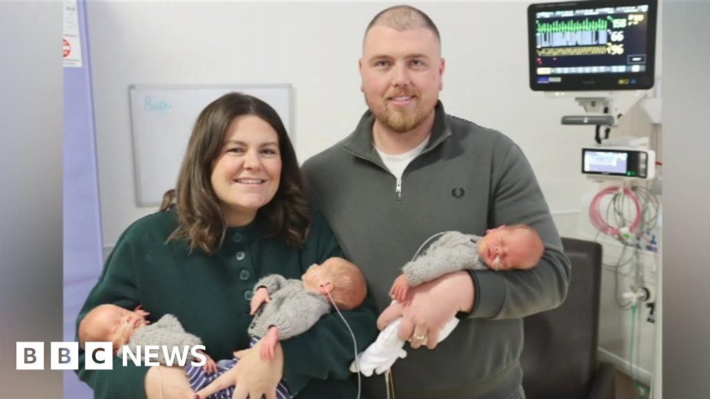 Rare identical triplets make it home for Christmas
